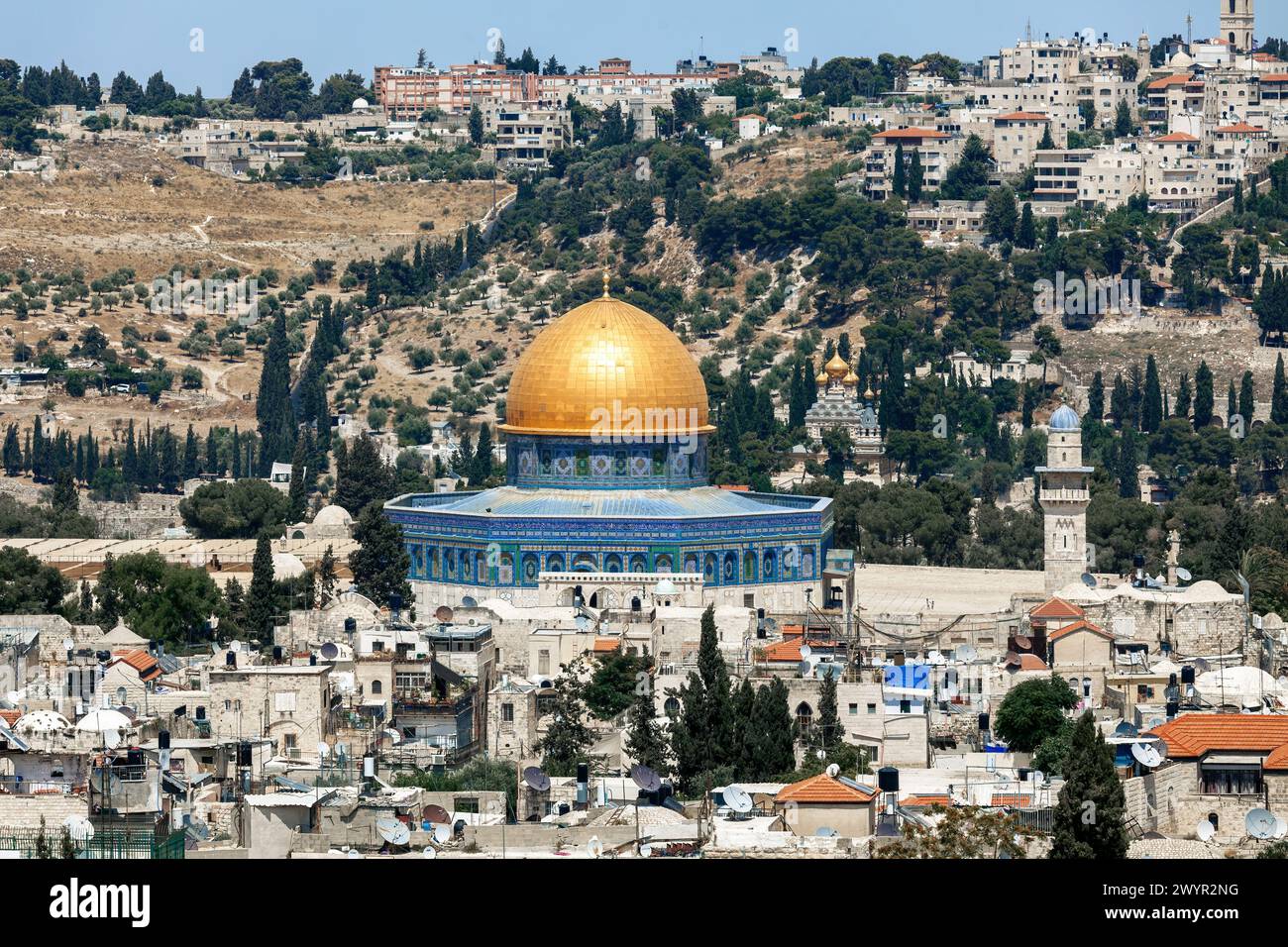 Aerial view of the famous Dome of the Rock mosque among old houses on ...