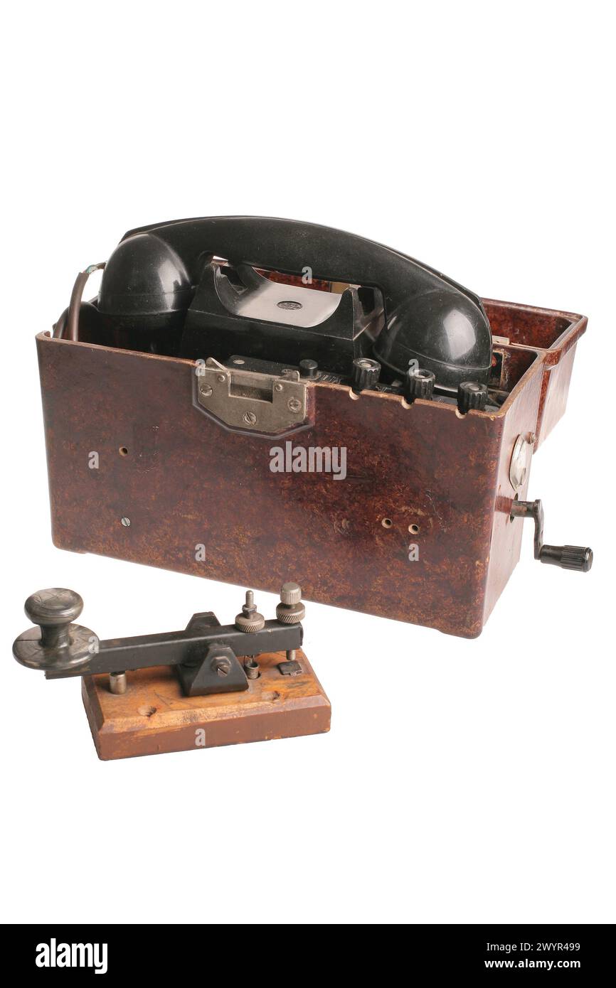 An old army phone isolated on a white background with cliping path ...