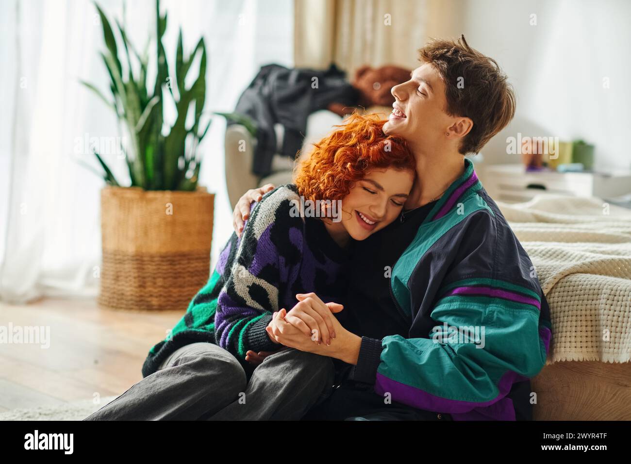 Two lovers hugging each other hi-res stock photography and images - Alamy