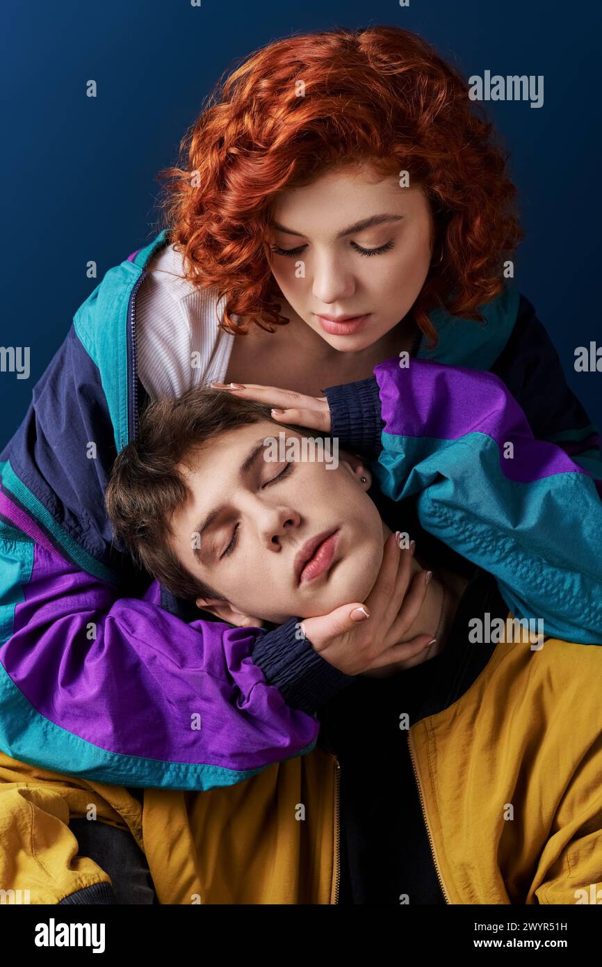 appealing loving boyfriend and girlfriend in colorful attires posing ...