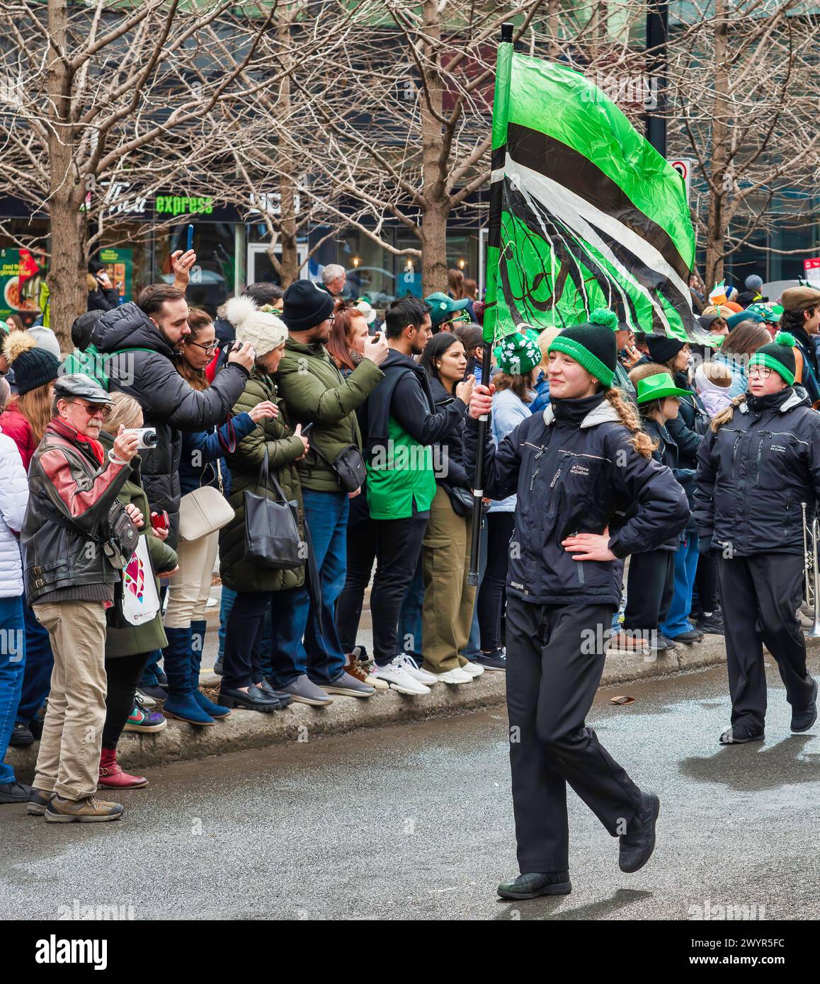 St. Patricks' Day Parade - Flag Leader Stock Photo - Alamy