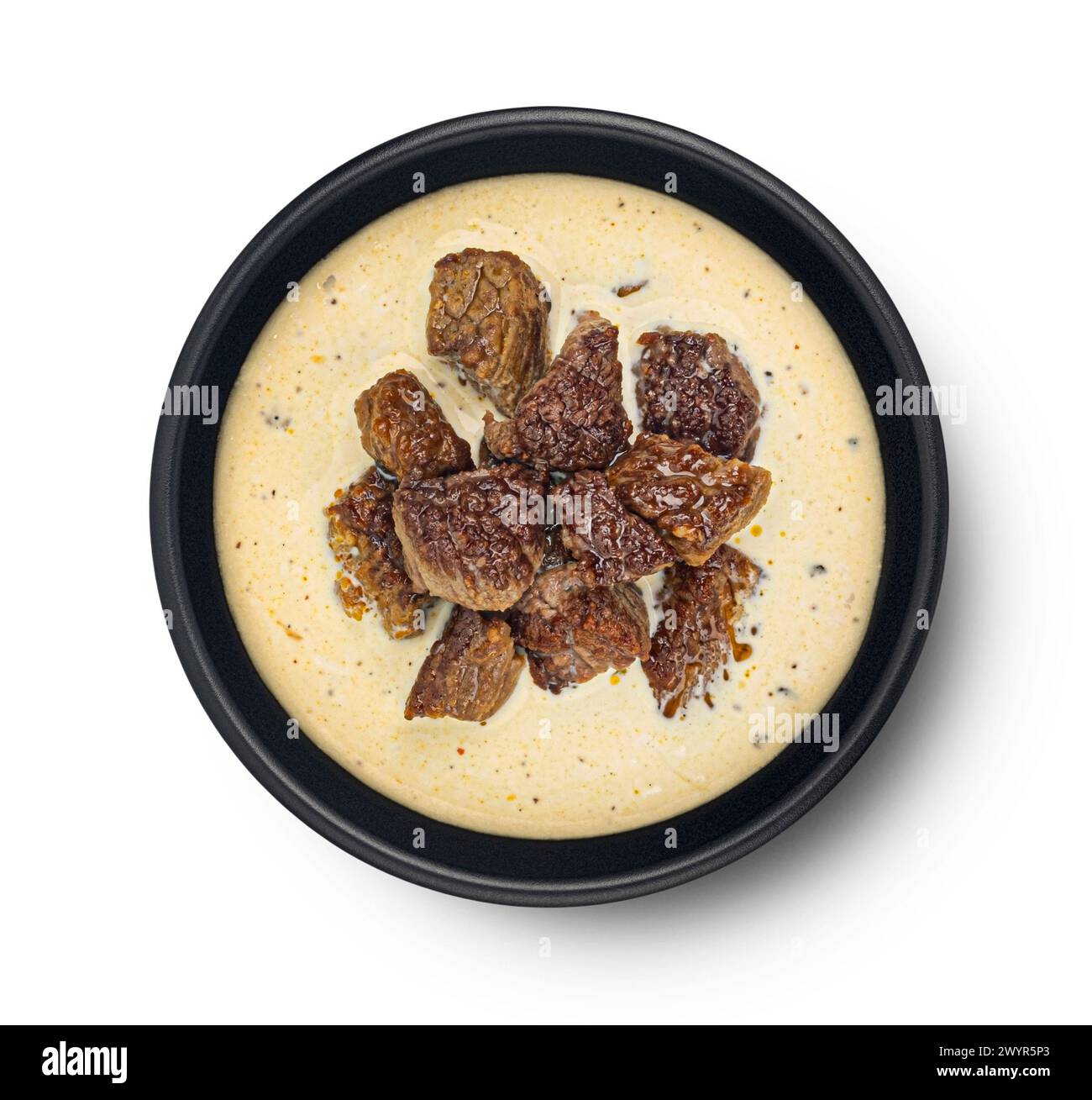 Meat goulash with cream sauce, beef stroganoff isolated on white ...