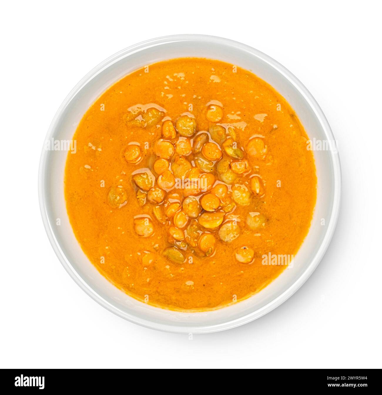 Lentil cream soup isolated on white background, top view Stock Photo ...
