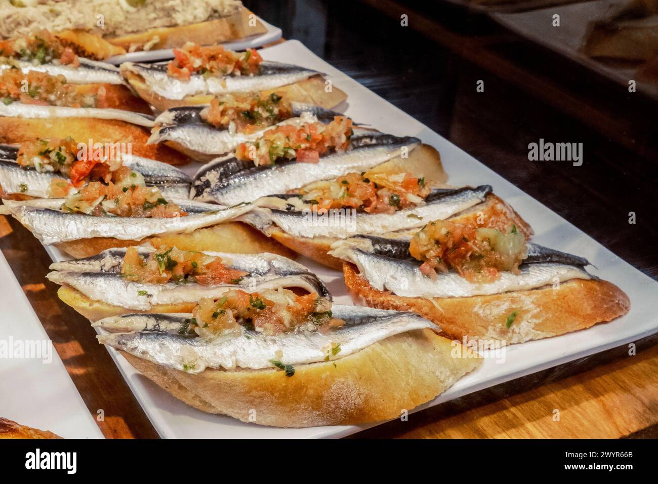 Tapas and pinchos at a food market in Spain. Traditional Spanish ...