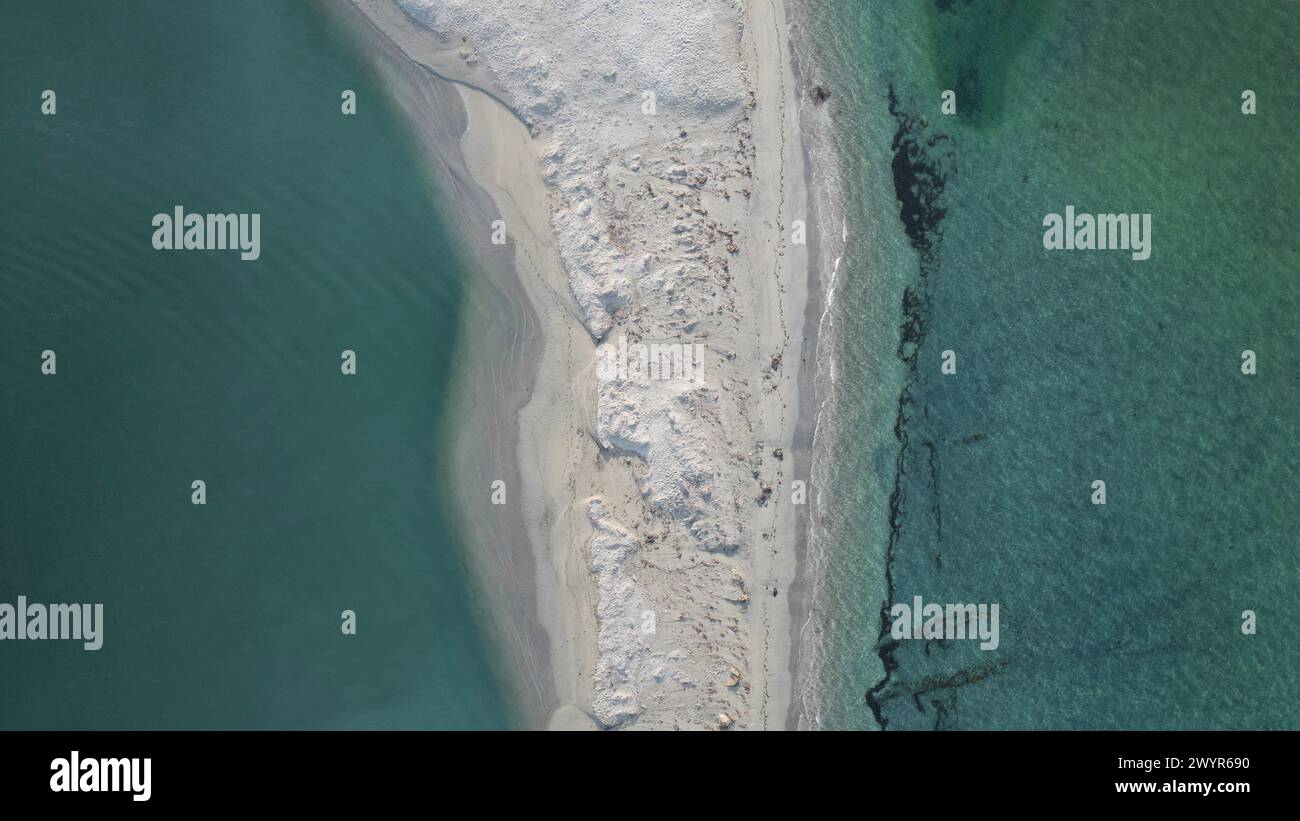 Aerial view of a sandy shoreline and blue seas Stock Photo - Alamy