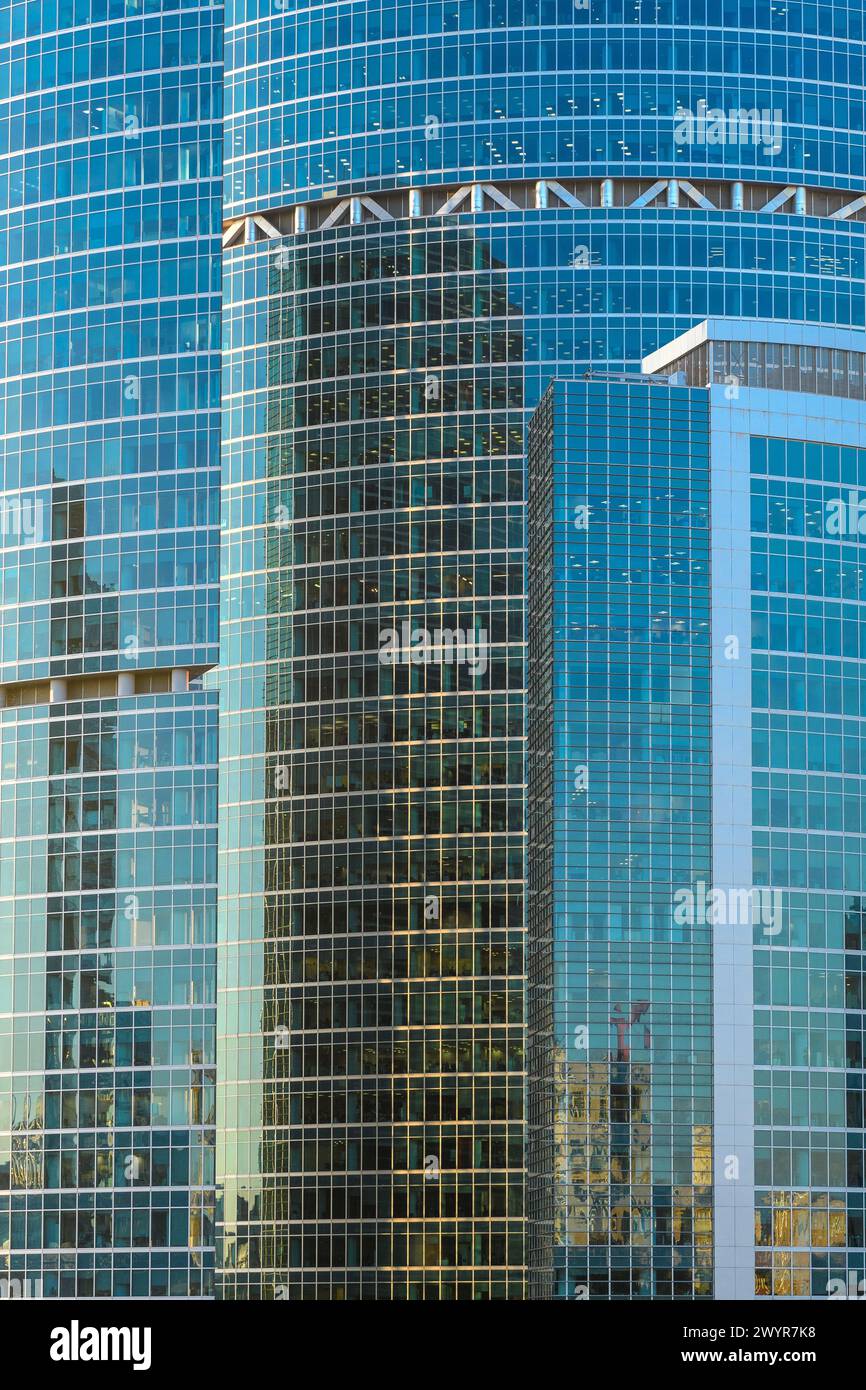 Buildings of modern architecture reflect each other in mirror walls ...