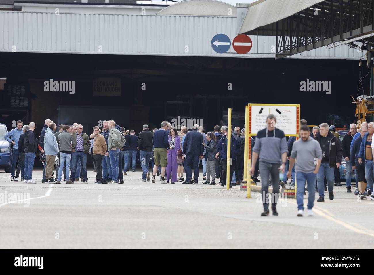 Workers pictured outside the Van Hool bus assembly plant in ...
