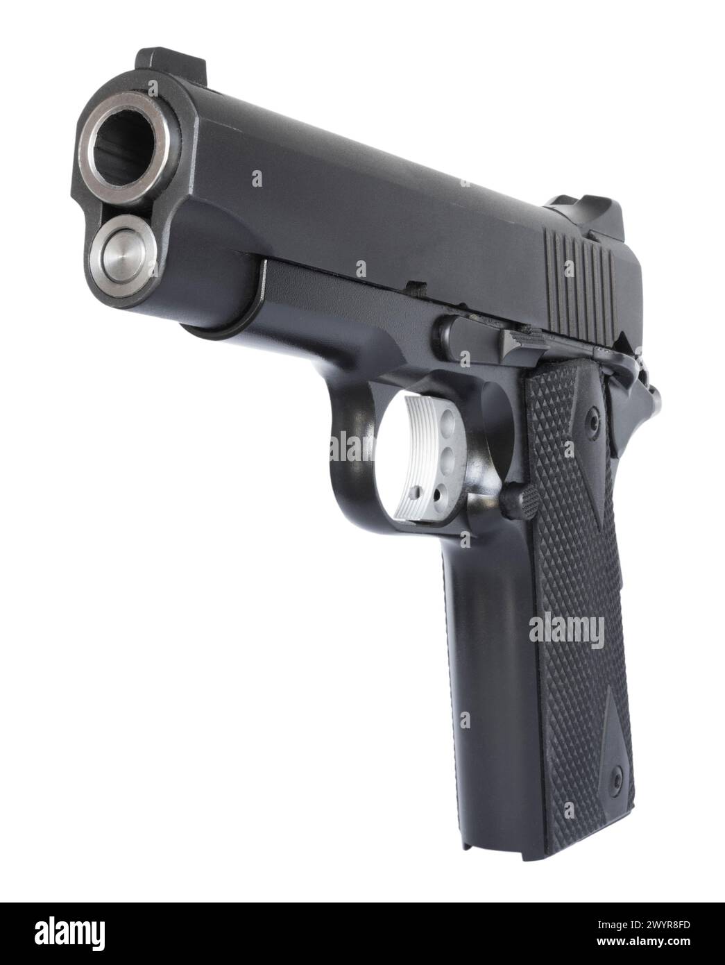 Large pistol pointed at he viewer that is semi automatic and chambered ...