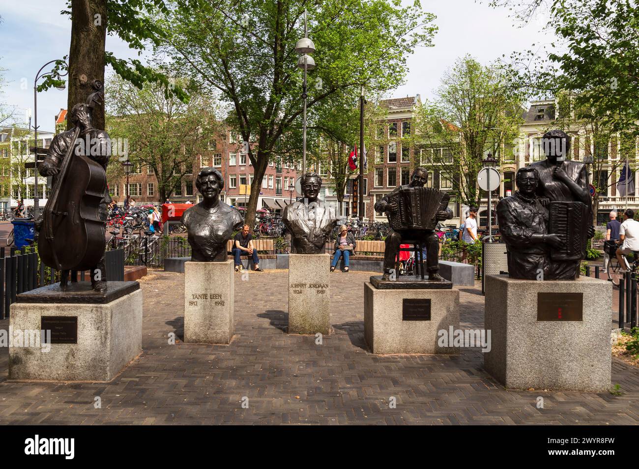Black statues of famous singers on the Johnny Jordaanplein on the ...