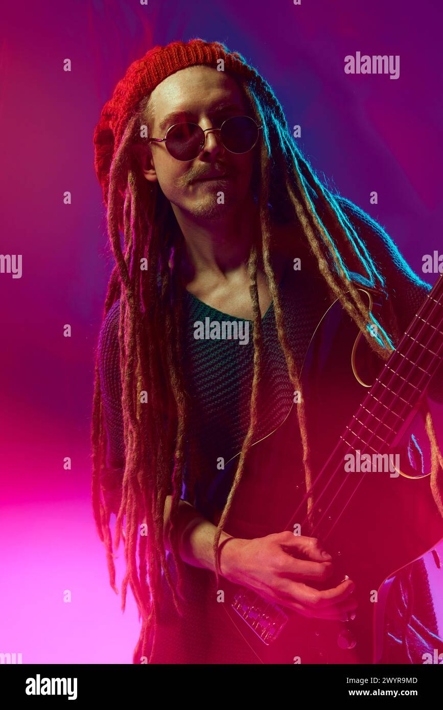 indie music style. Portrait of artistic male musician with dreadlocks ...