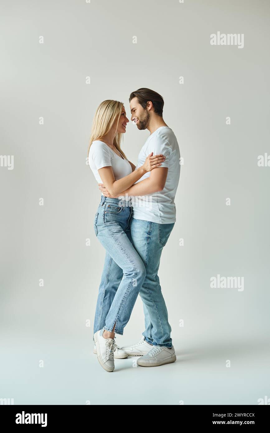 A sensual moment captured as a couple passionately embraces each other ...