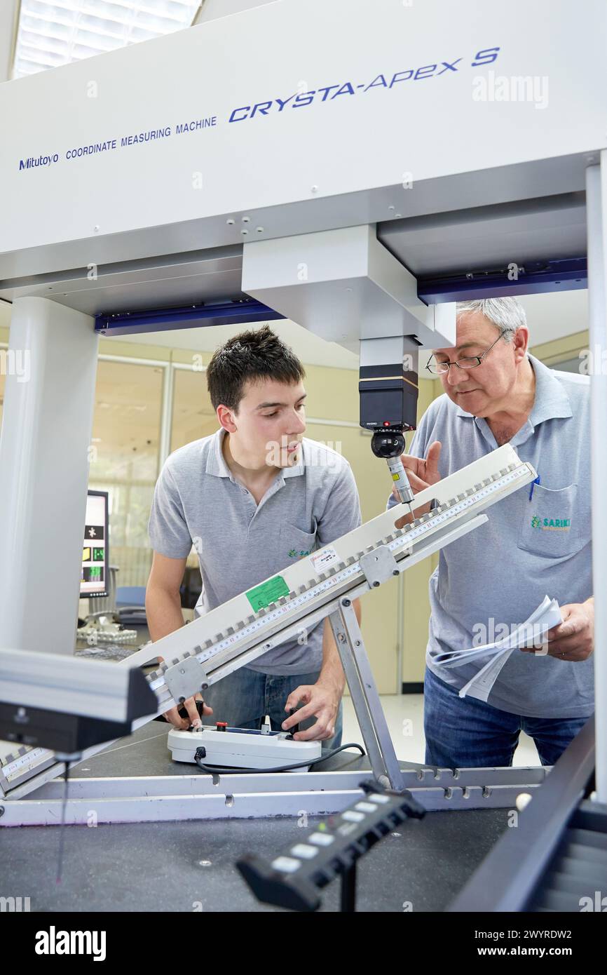 The SAT team calibrating three-dimensional machine. Calibration of CMM ...