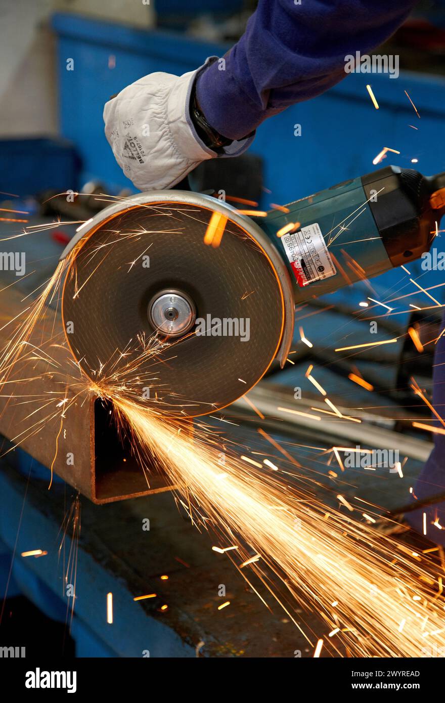 Cutting square hollow steel section, grinding machine with abrasive ...