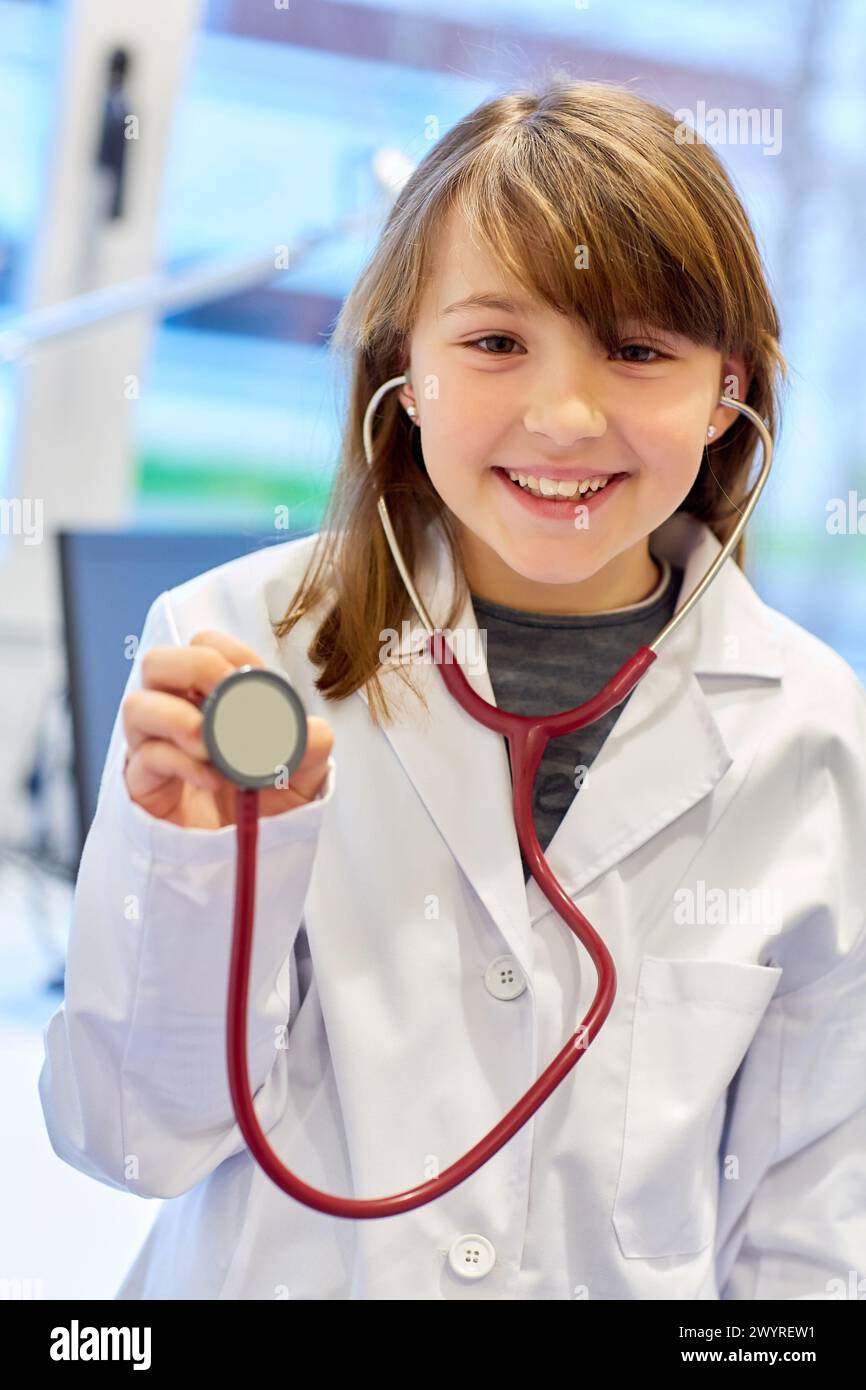 Girl dressed up doctor hi-res stock photography and images - Alamy