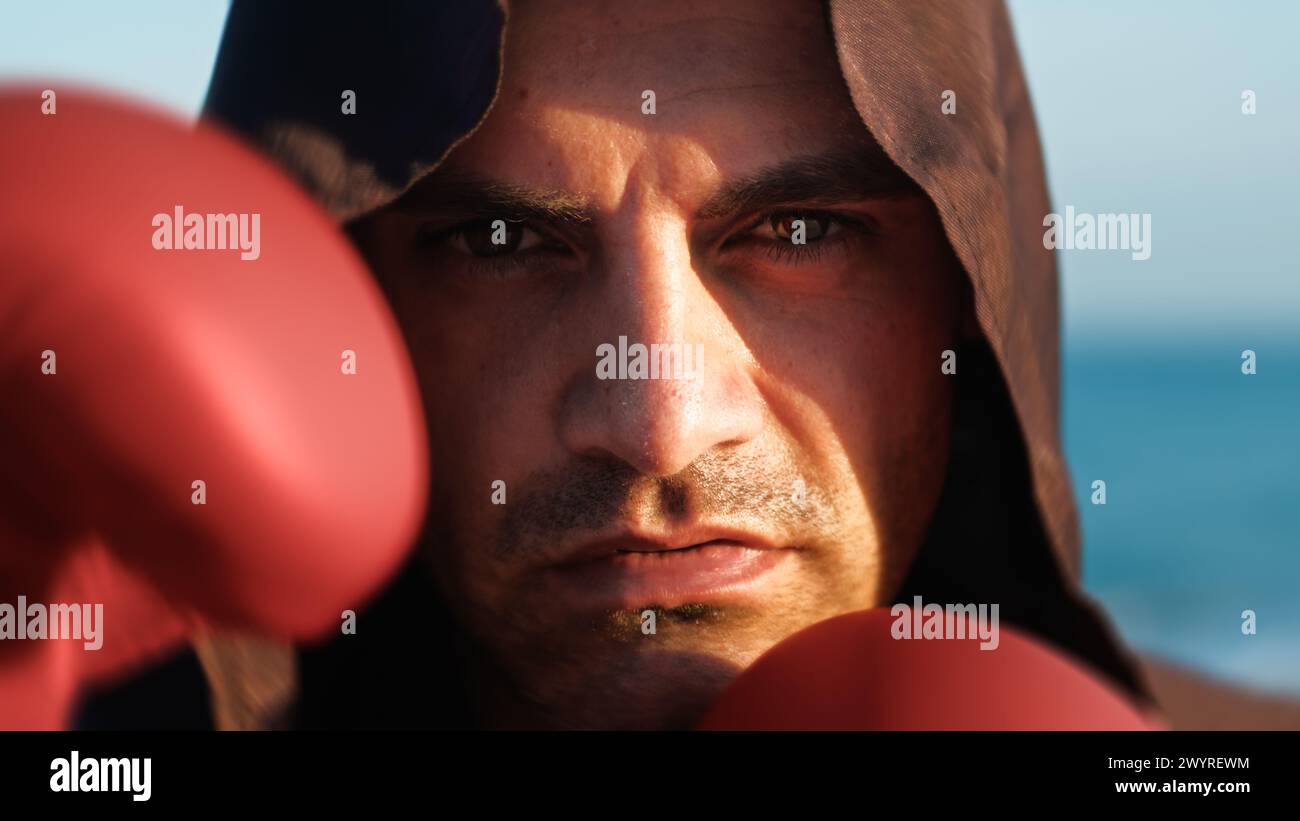 Ipnotic Gaze Of An Hooded Monk Ready To Fight Stock Photo - Alamy