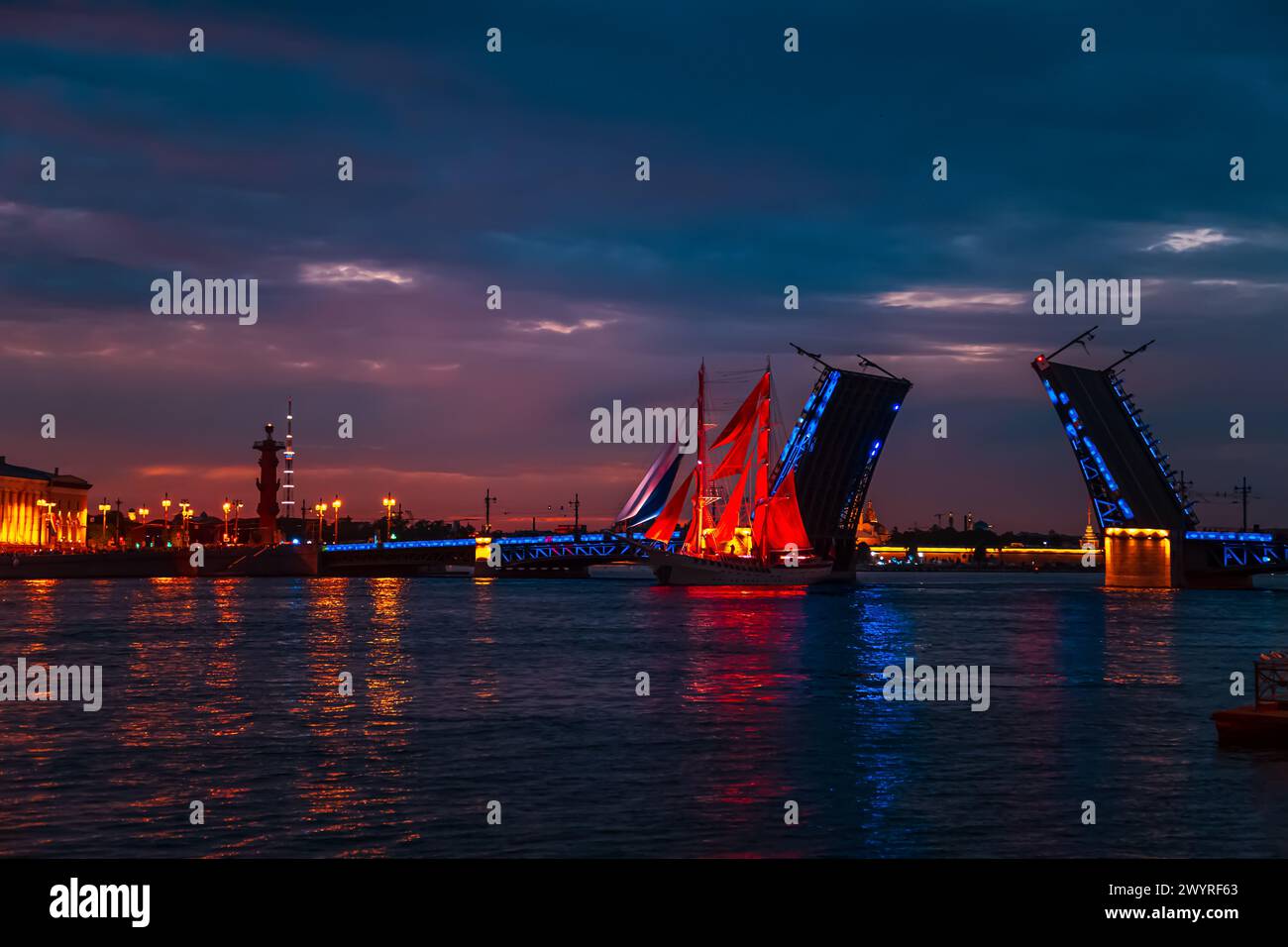 Brig with scarlet sails near the open Palace Bridge. White Night. St. Petersburg, Russia – June ...