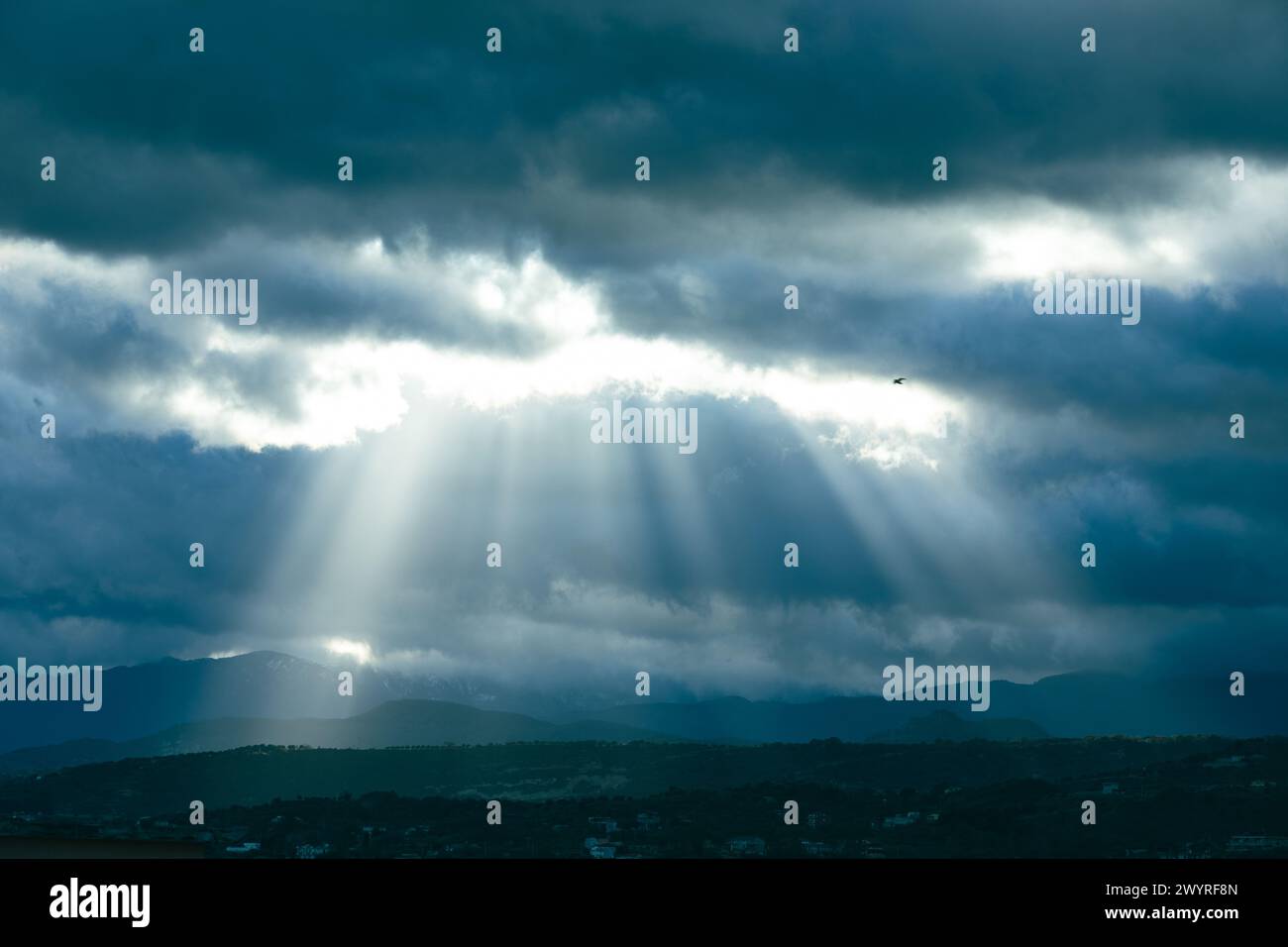 God's Power In The Sunlight Through The Clouds Stock Photo - Alamy