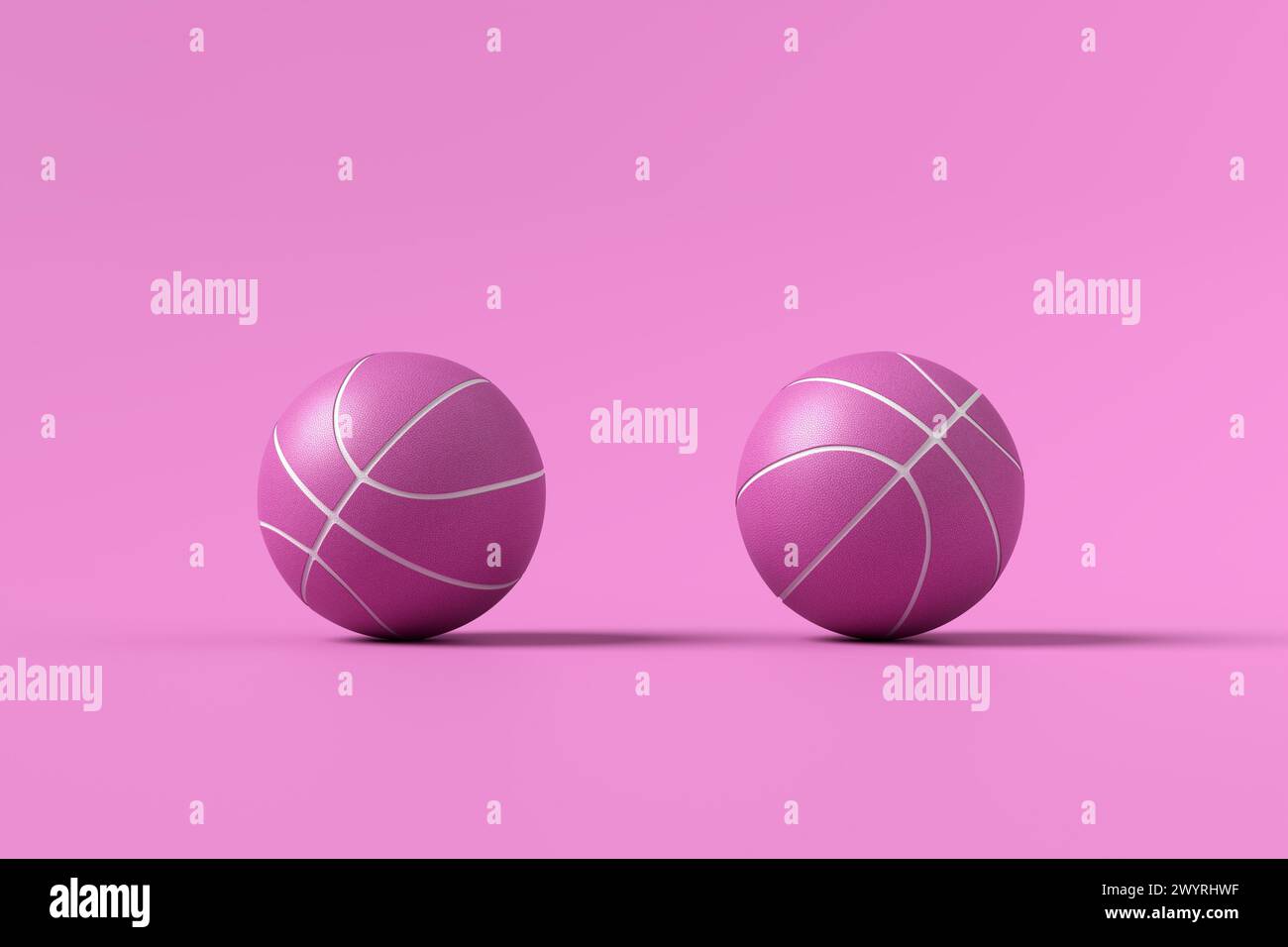 Two pink basketball balls on pink background. Basketball game, sports ...