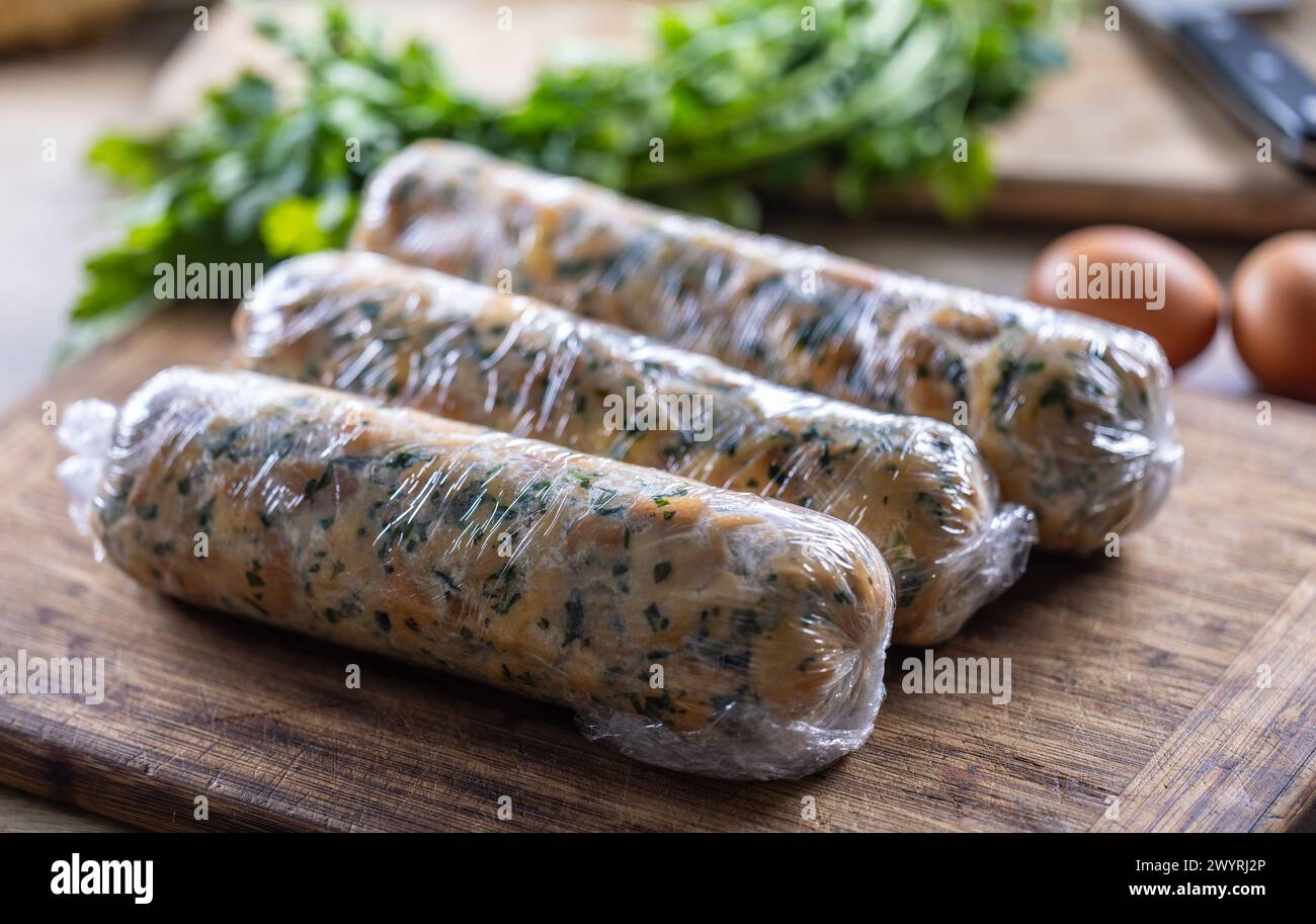 Preparation of Karlovy Vary dumplings wrapped in plastic foil ...