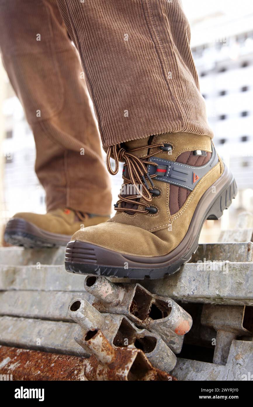 Construction worker boots detail hi-res stock photography and images ...