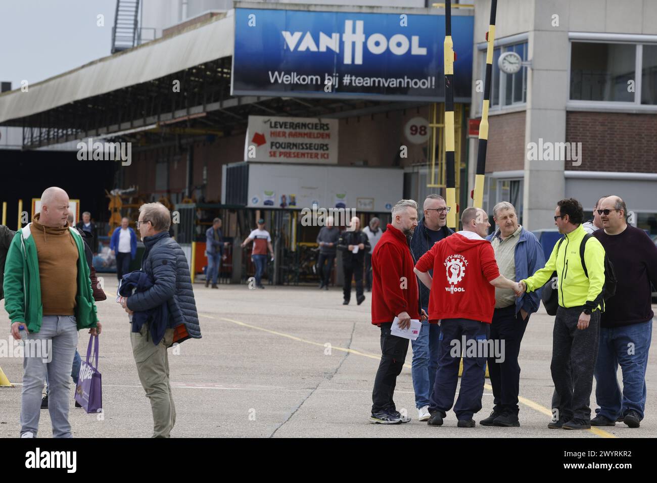 Workers pictured at the Van Hool bus assembly plant in Koningshooikt ...