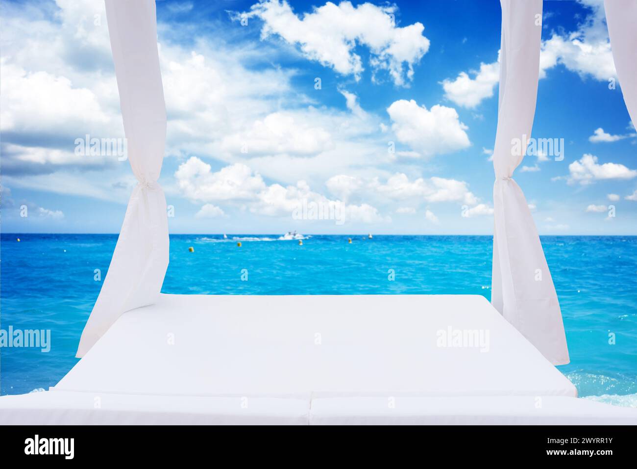 Relaxation area. Spa on the beach with balinese spa bed Stock Photo - Alamy
