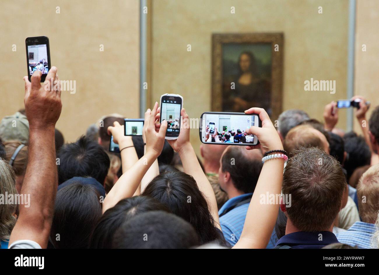 Tourists photographing Mona Lisa painting. Louvre Museum. Paris. France ...