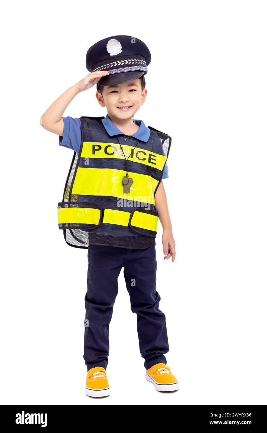 child dressed as a police officer standing before white background Stock Photo - Alamy