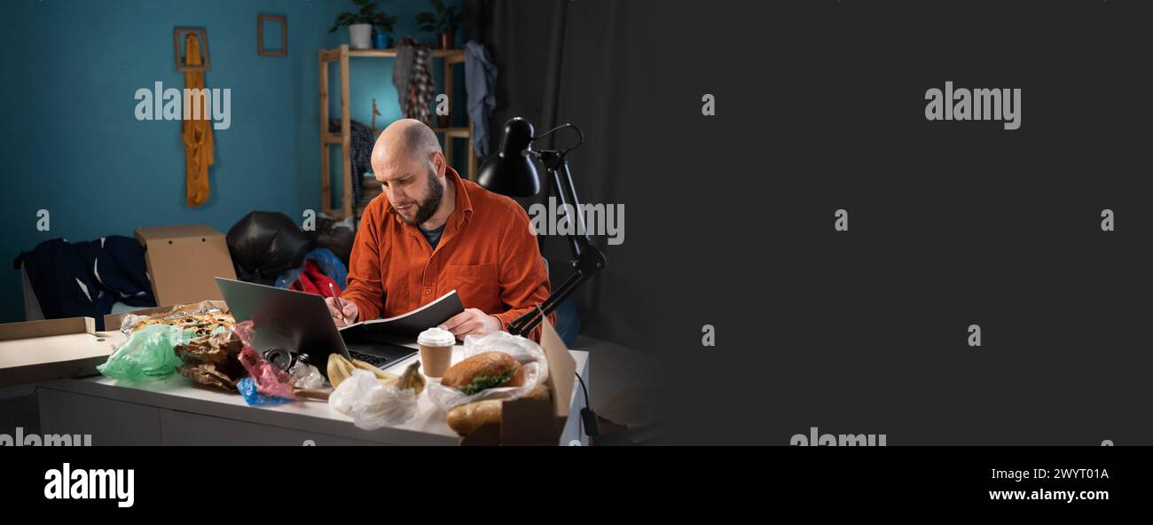 Freelancer or student working in Messy room with piles of clothes Stock ...