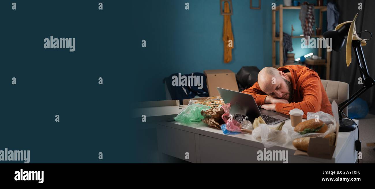 Tired man sleeping on table in Messy, cluttered room with piles of ...