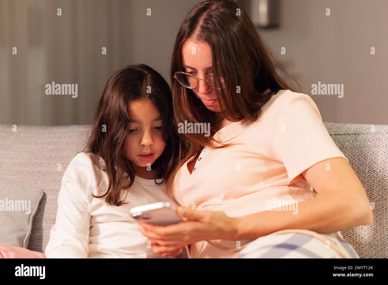 Teen mobile tv sofa hi-res stock photography and images - Alamy