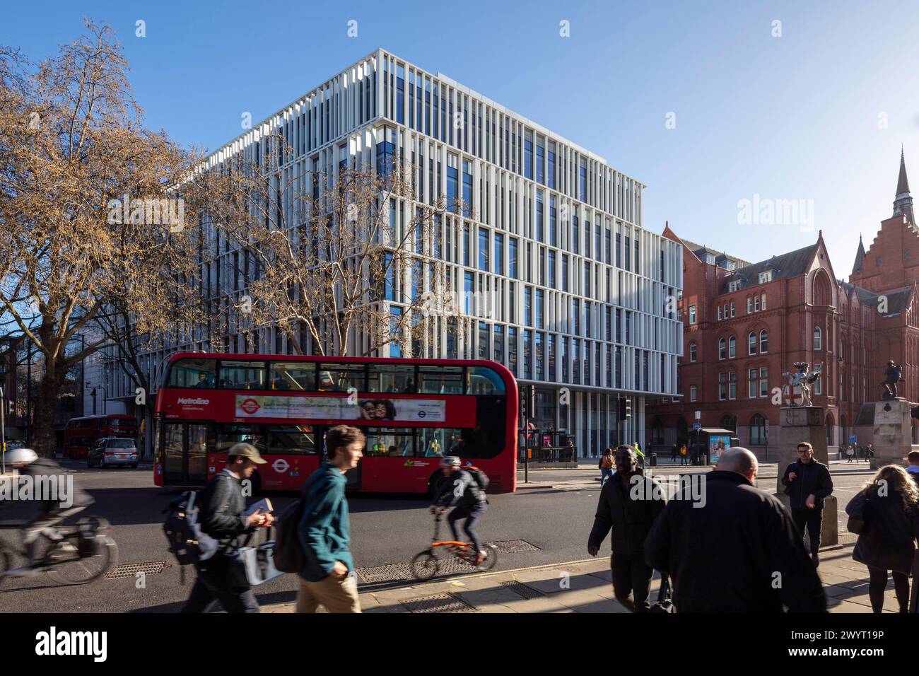 Early morning exterior view of 150 Holborn with commuters heading to ...