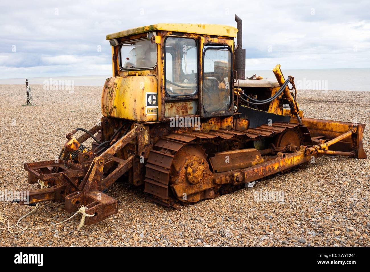 Bulldozer on shingle beach Stock Photo - Alamy