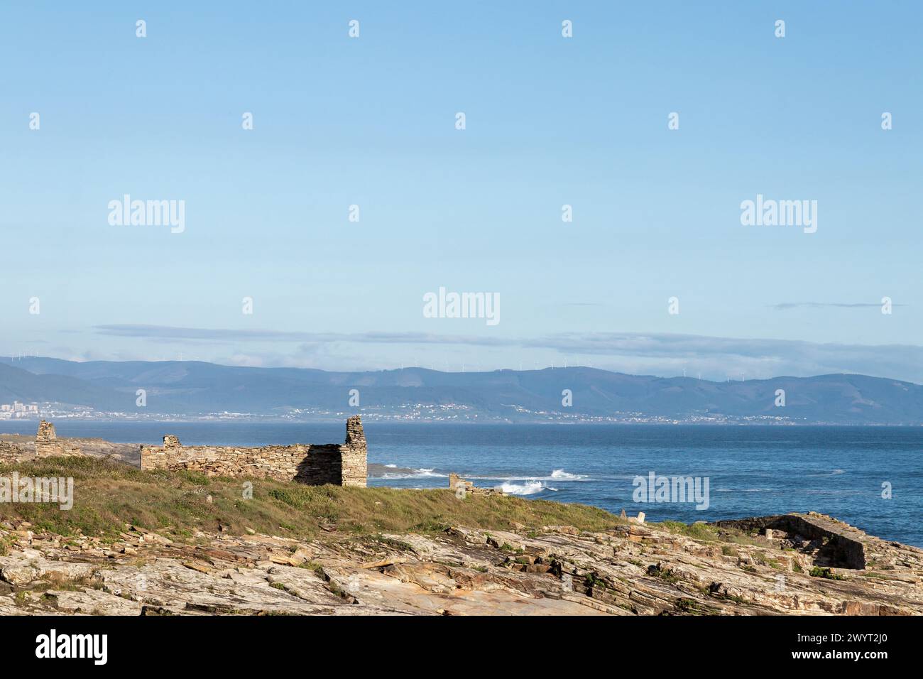 landscape, ancient ruins, grassy terrain, blue ocean, distant mountains ...