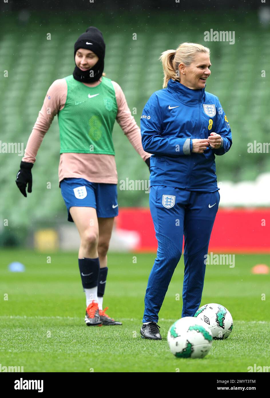 England head coach Sarina Wiegman (right) and Lotte Wubben-Moy during a ...