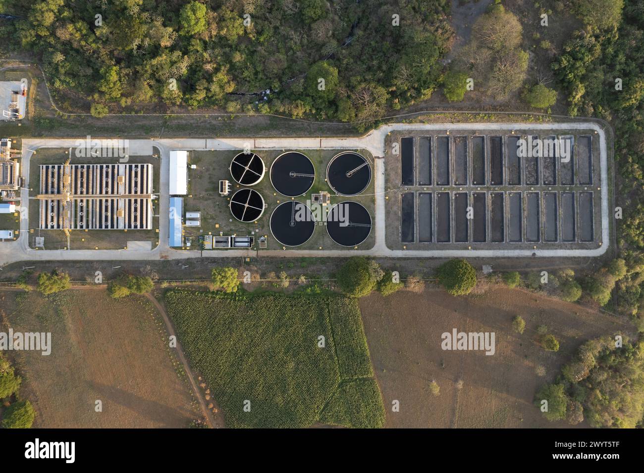 Recycled water plant factory tanks above top drone view Stock Photo - Alamy