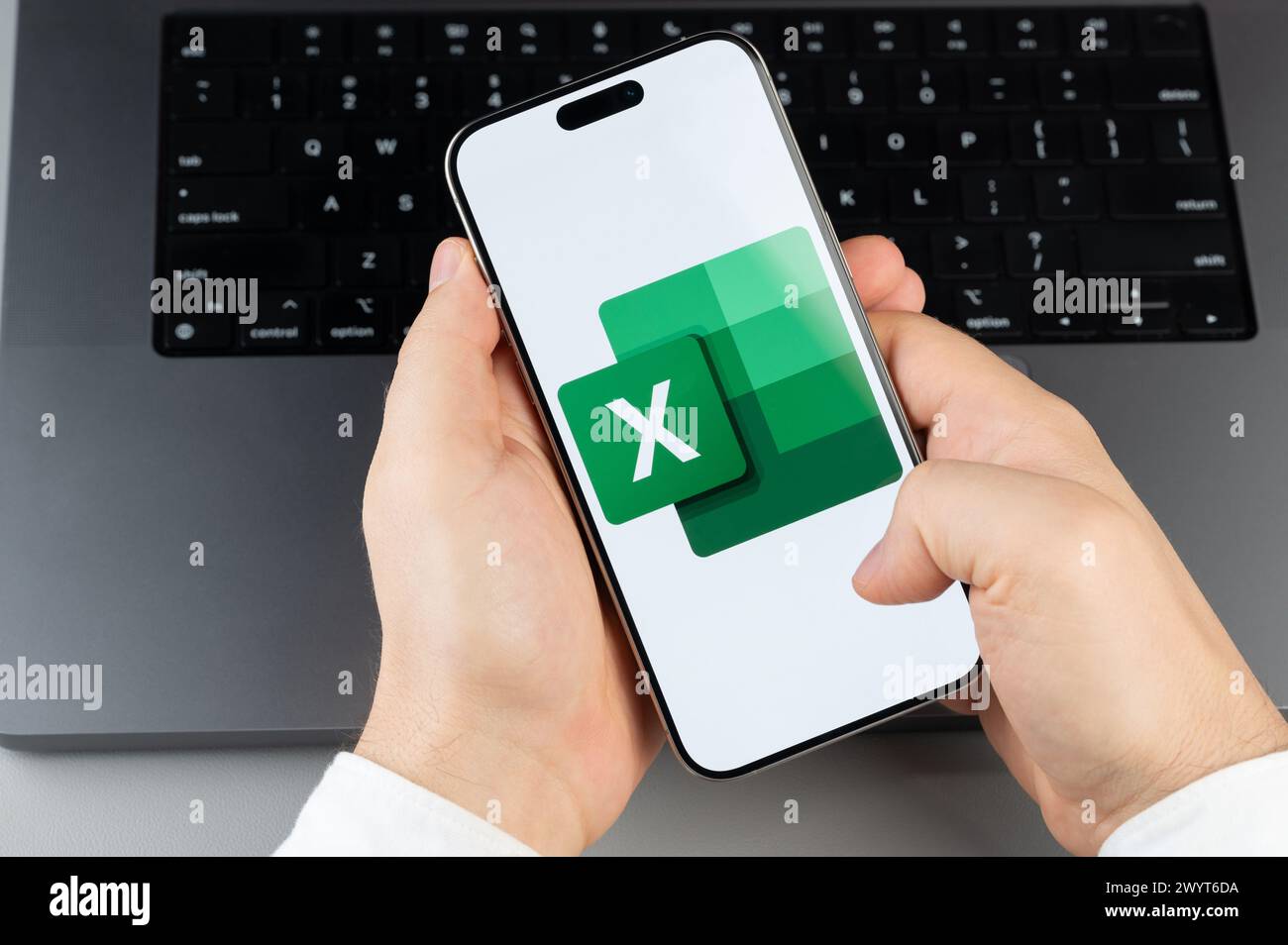 New York, USA - April 6, 2024: Popular Microsoft excel mobile app on smartphone screen in hands ...