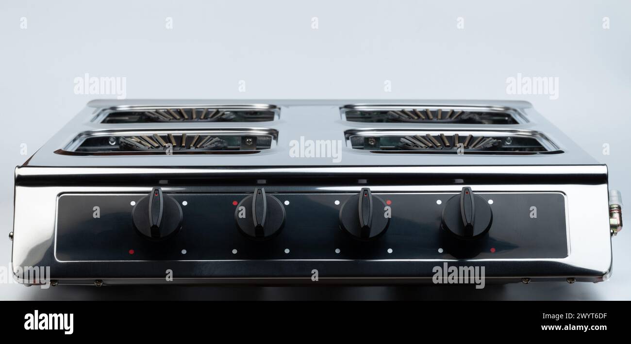 Metallic gas oven top part front view isolated on white studio ...