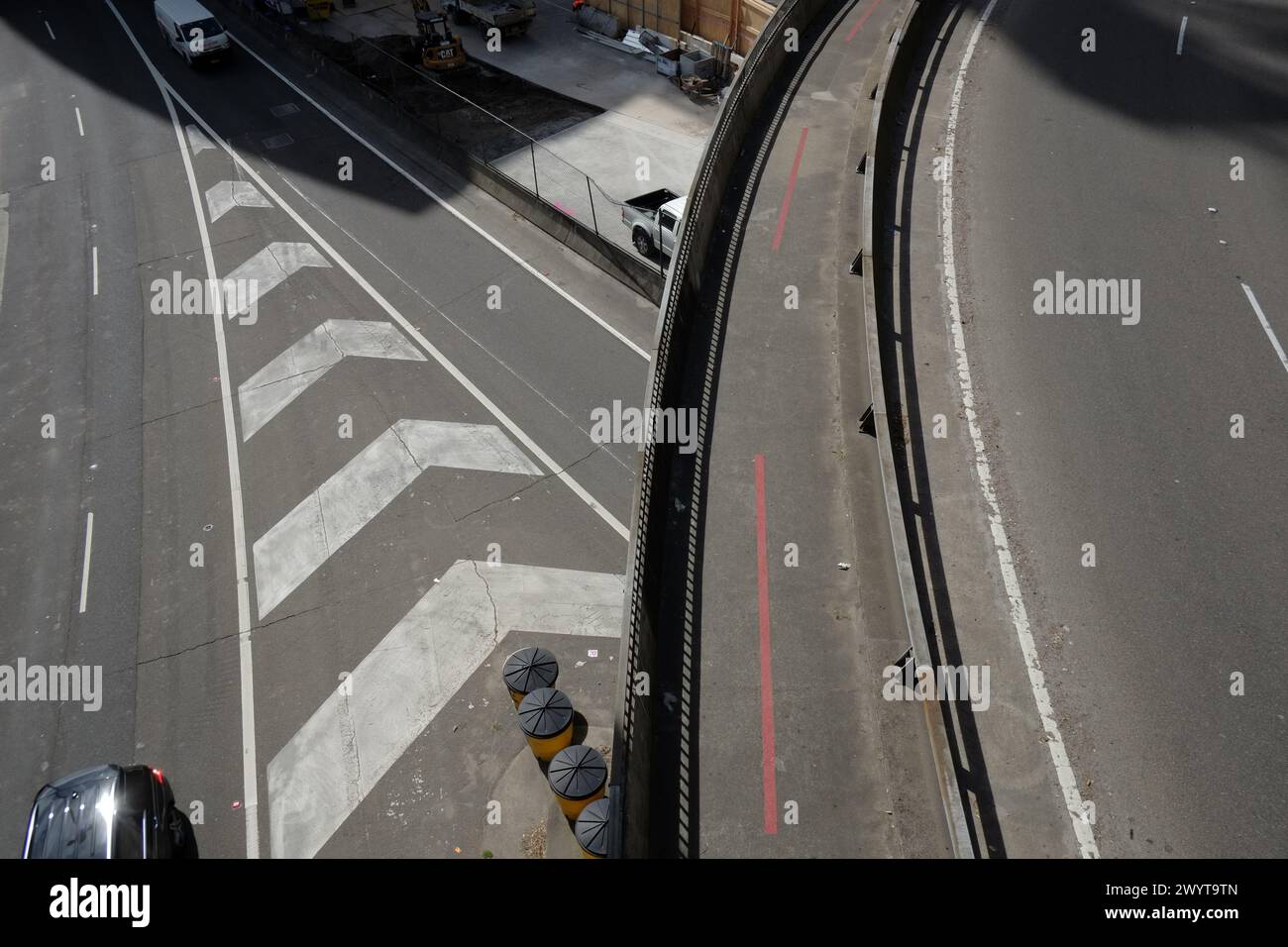 Looking past the curve of an elevated road dissecting the wide mass of ...