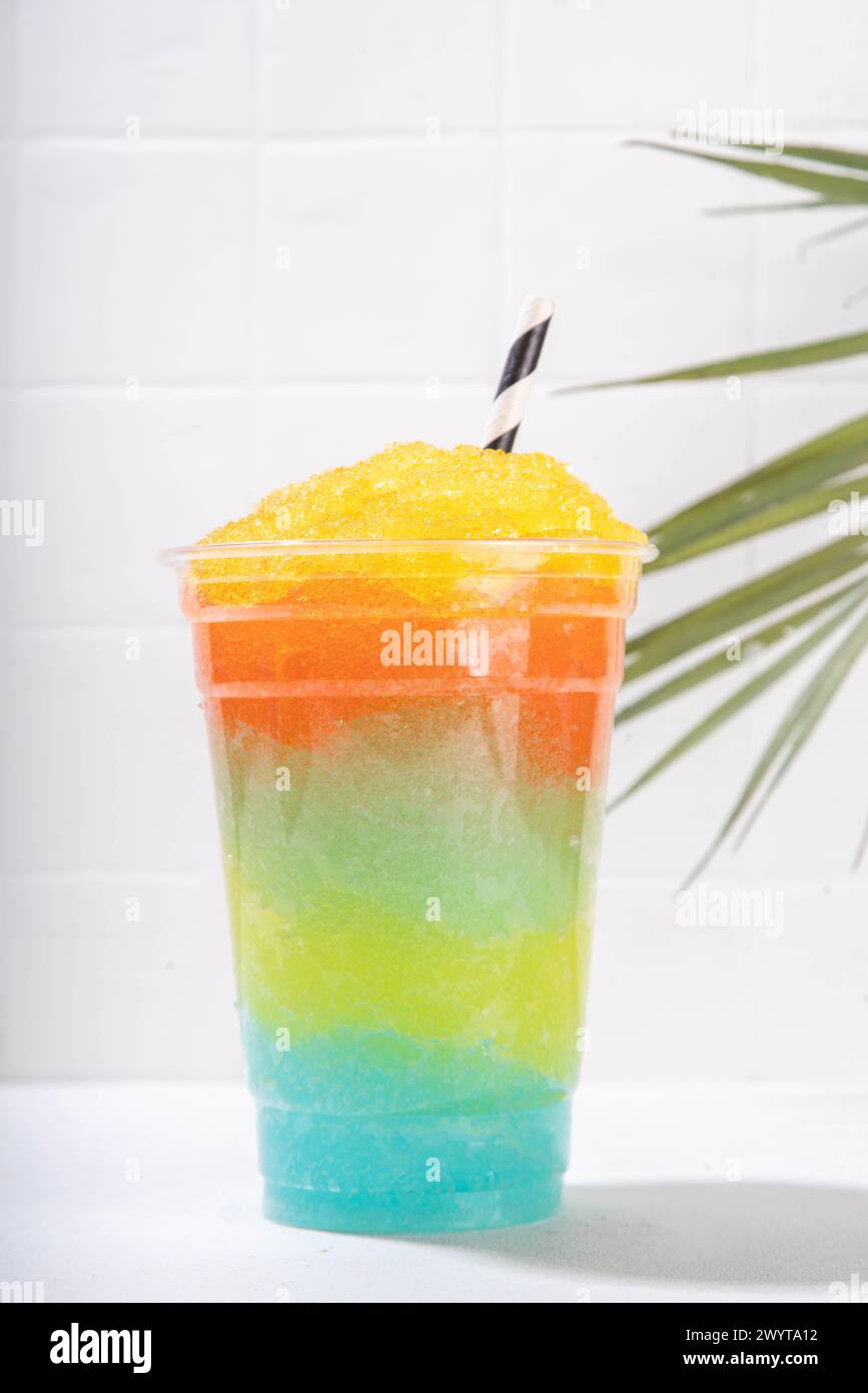 Colorful slushie drink, multicolored frozen juice cocktail, summer ...