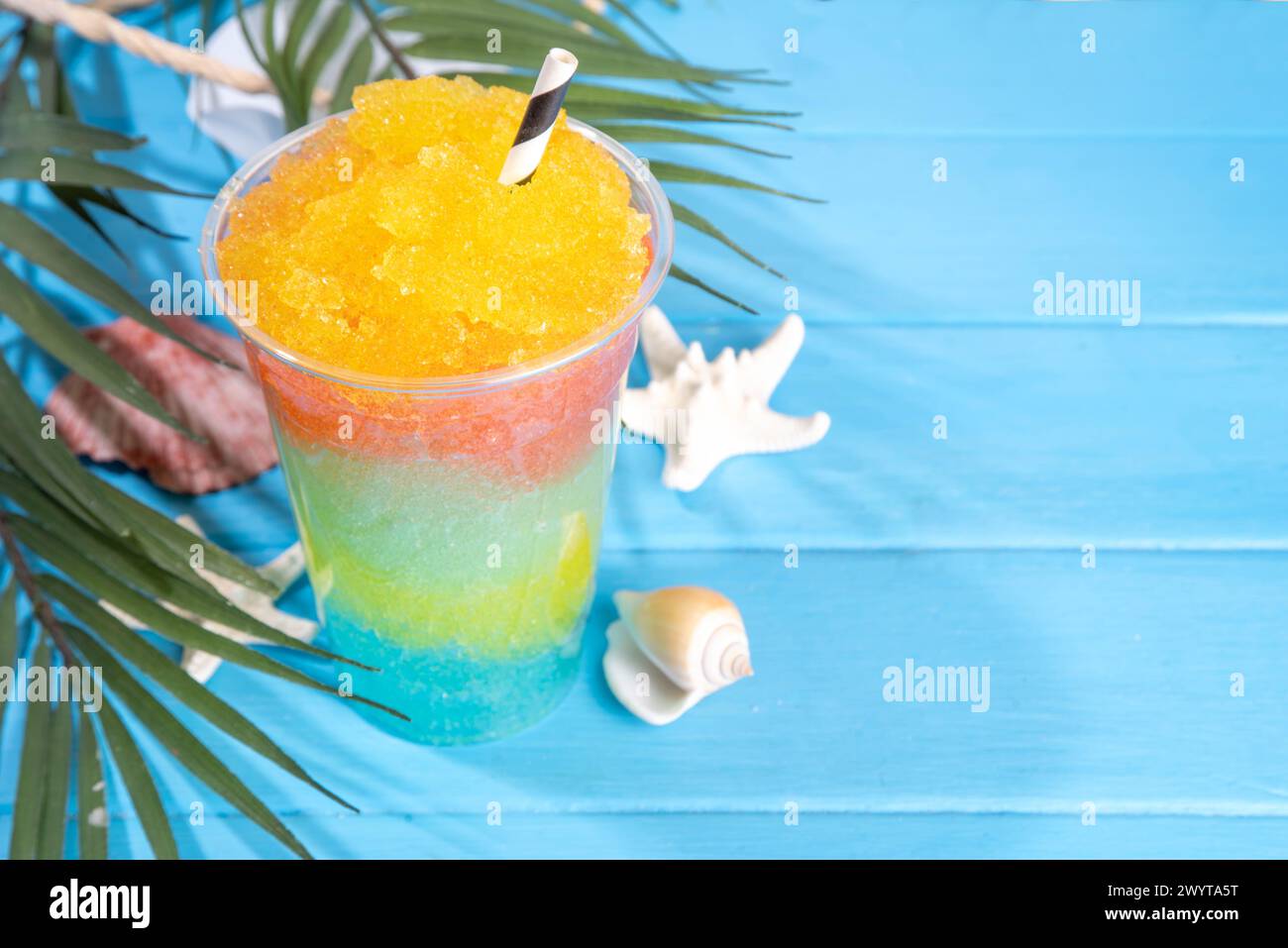 Colorful slushie drink, multicolored frozen juice cocktail, summer ...