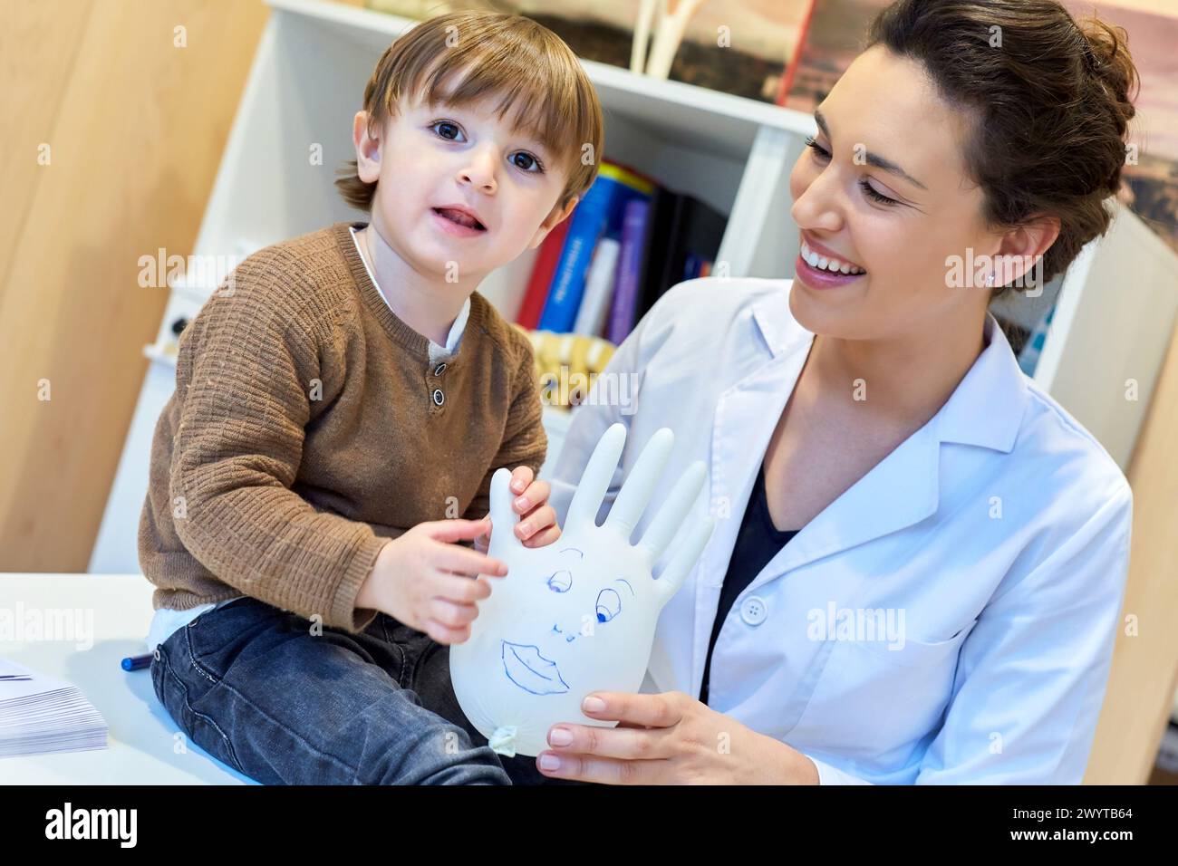 Hand child. Congenital hand. Doctor attending to patient medical ...