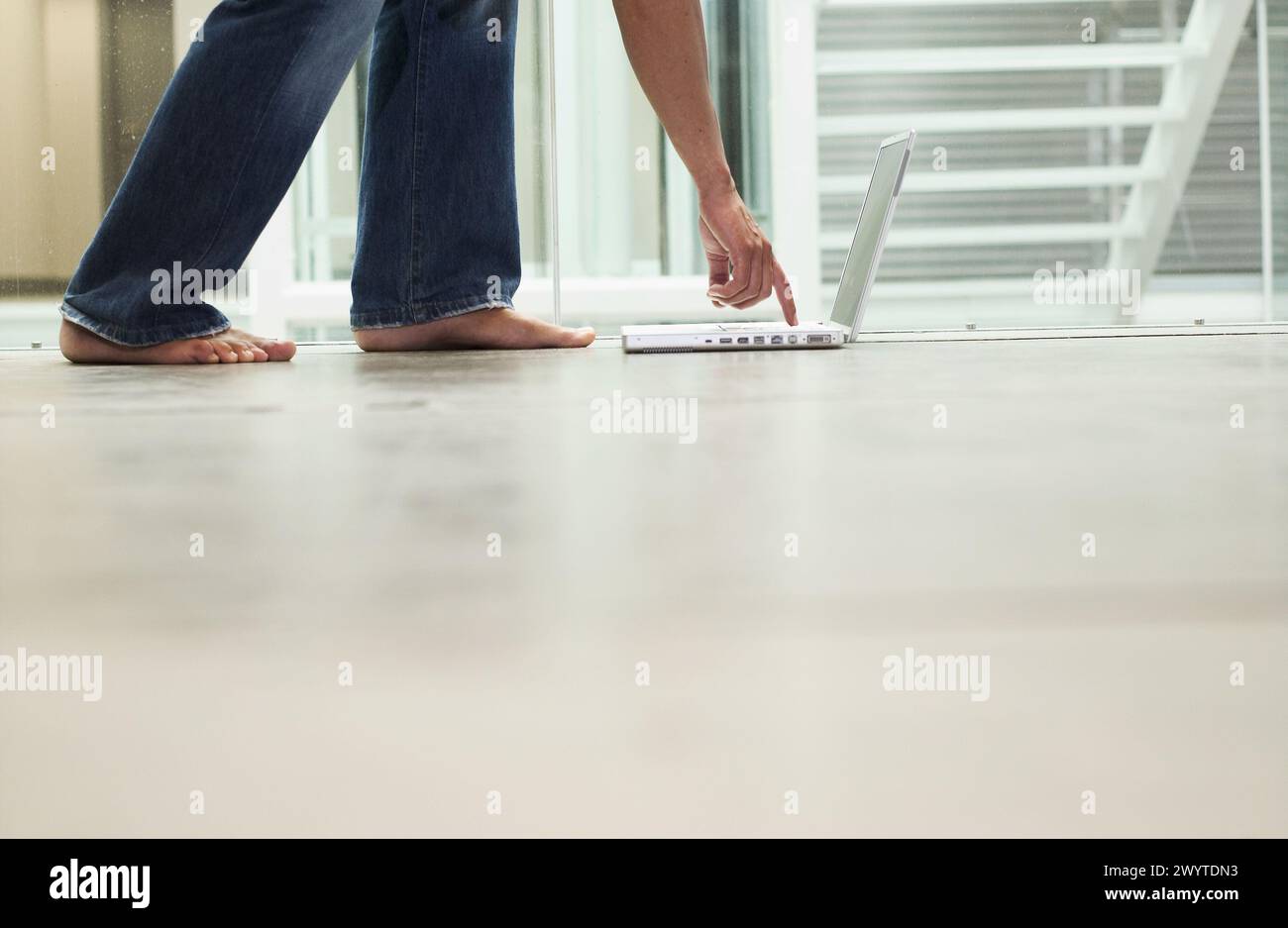 Stooping man hi-res stock photography and images - Alamy