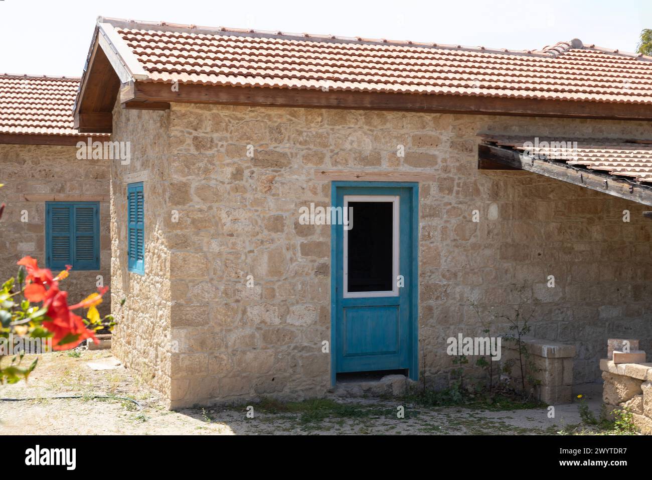 Paphos, Cyprus. 31 March, 2024: Rustic Stone House with Blue Accents In ...