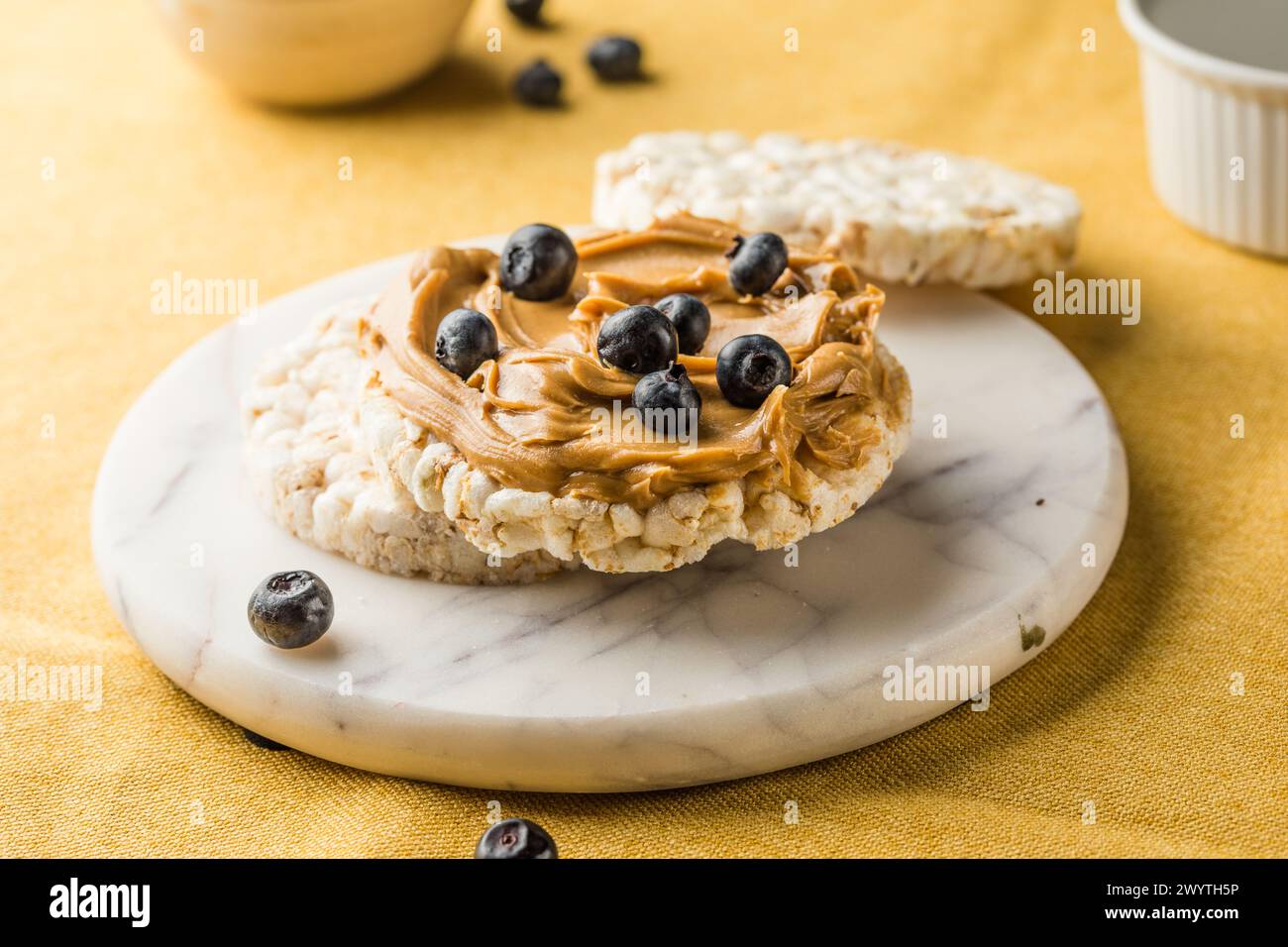Peanut butter and rice cakes sandwich. Healthy protein snack Stock ...