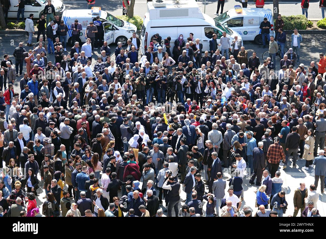 A crowd can be seen gathering in front of the Diyarbakir Metropolitan ...