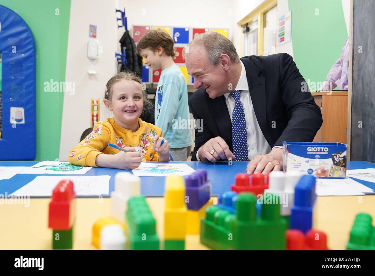 Liberal Democrat Leader Sir Ed Davey interacts with Isabel, 7, (no ...