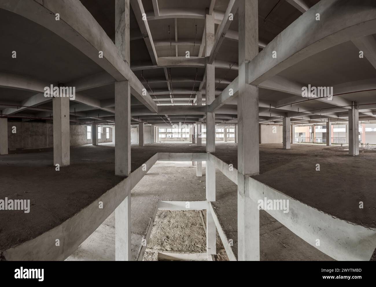 A cement structure inside an unfinished building Stock Photo - Alamy