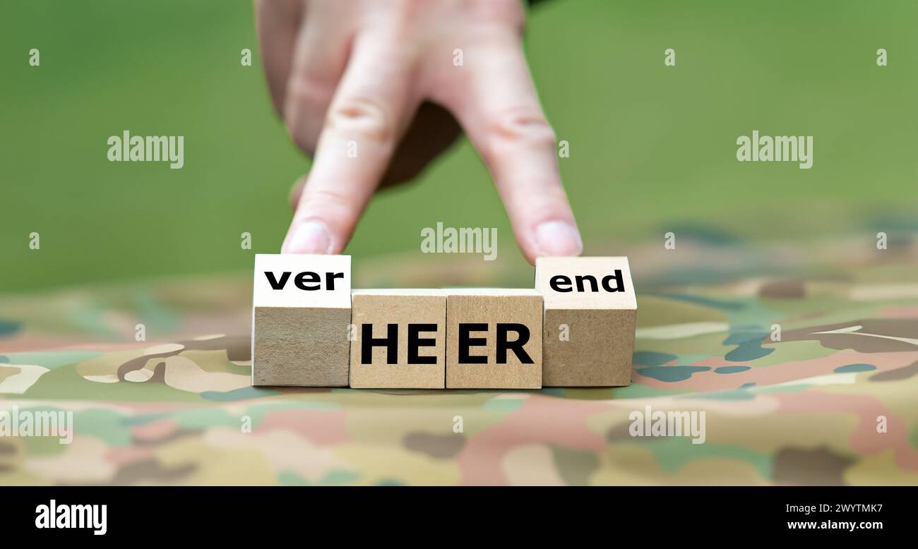 Hand turns cube and changes the German word 'Heer' (army) to ...
