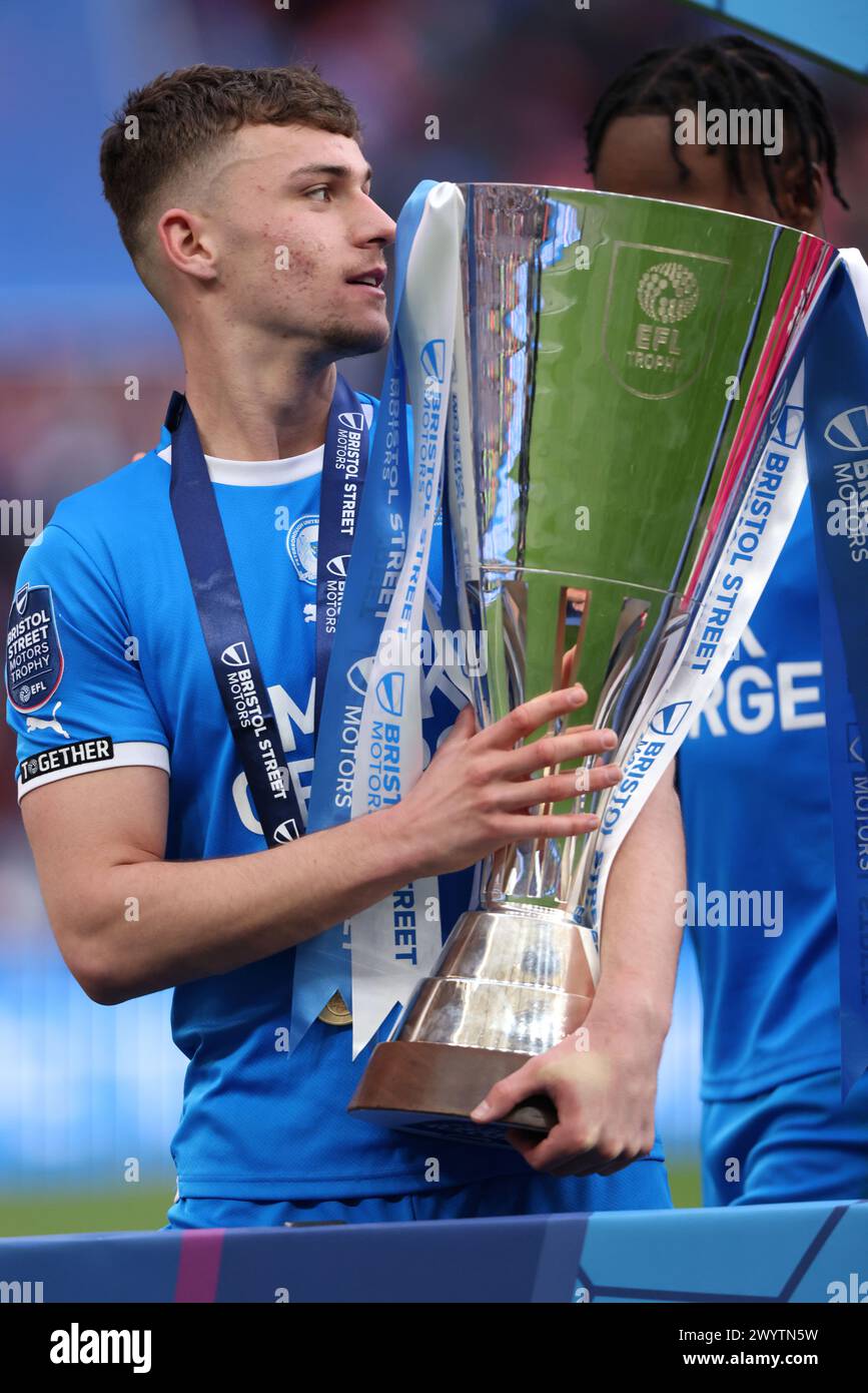 London, UK. 07th Apr, 2024. Harrison Burrows (PU) with the trophy at ...